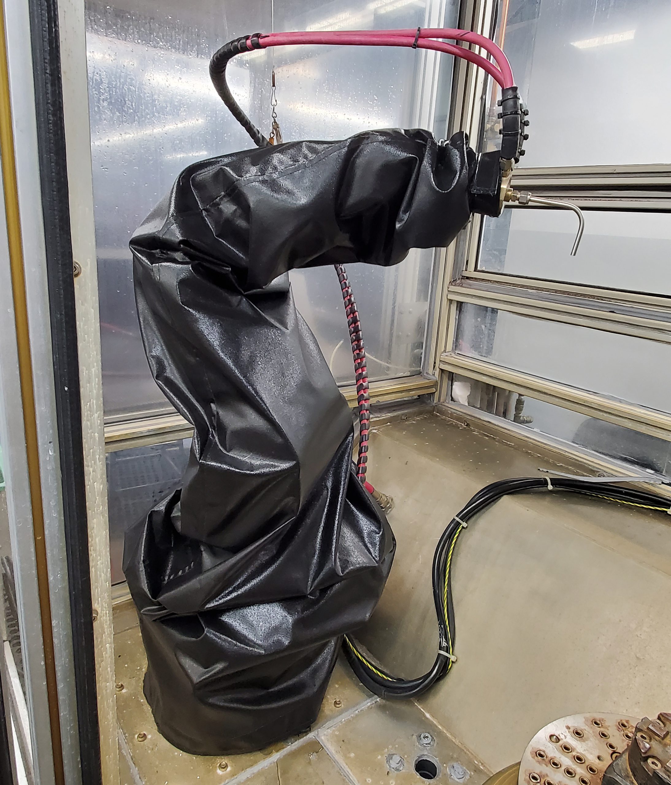 How Does a Robot Protective Cover Withstand Welding Heat and Spatter?